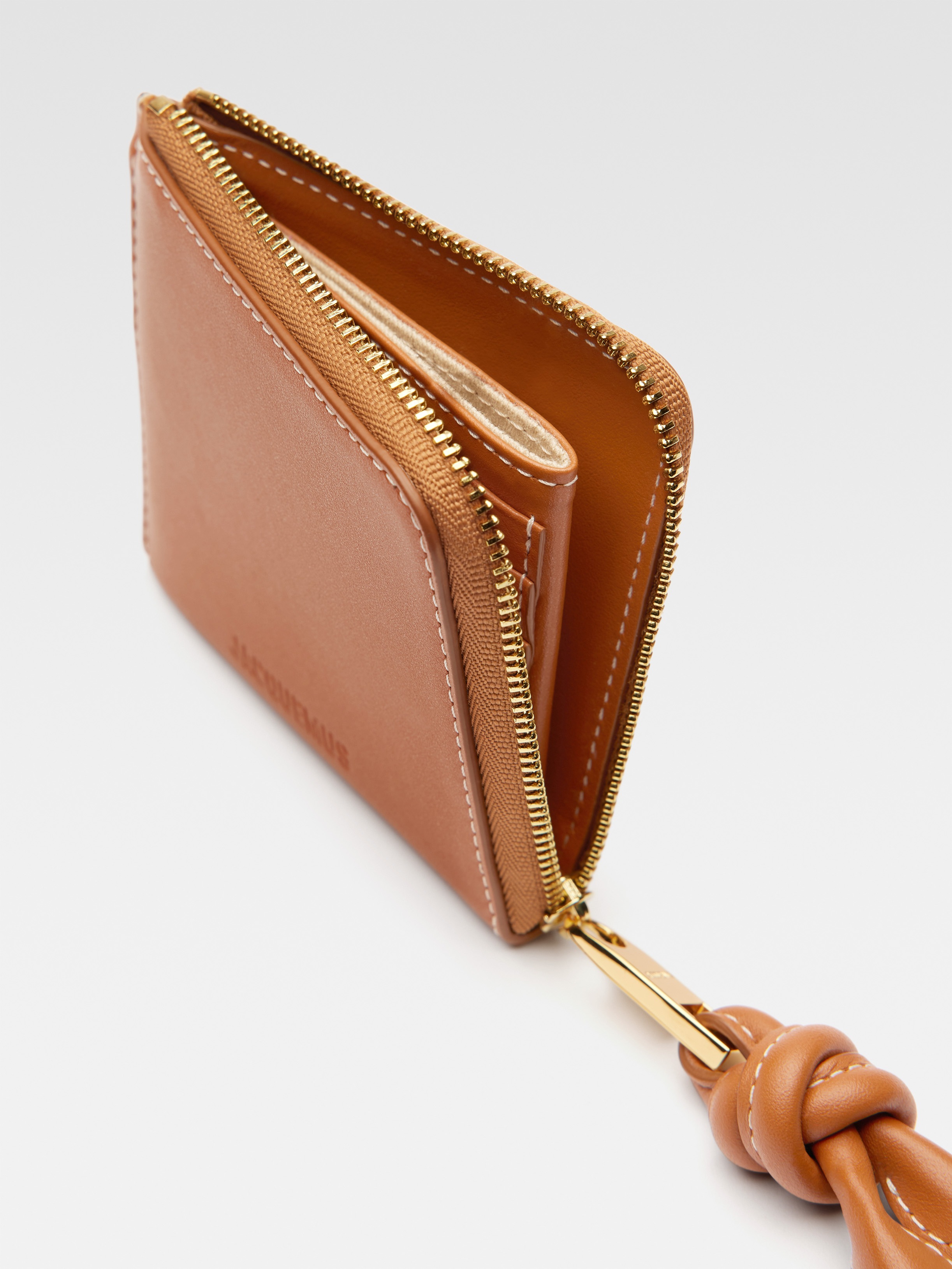 Le porte-monnaie Tourni by JACQUEMUS | Official website